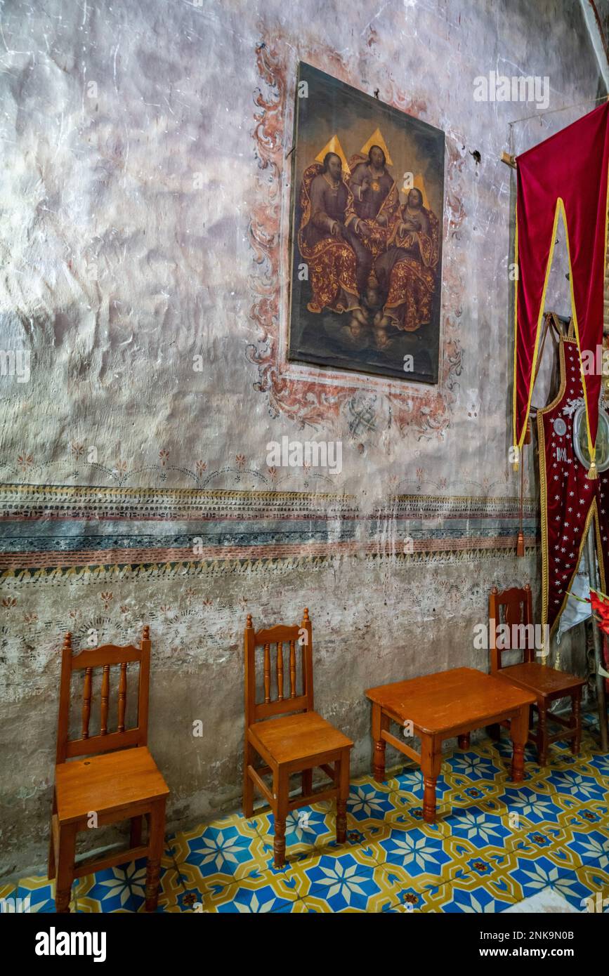 An antique painting of the Holy Trinity in the Spanish colonial Church ...