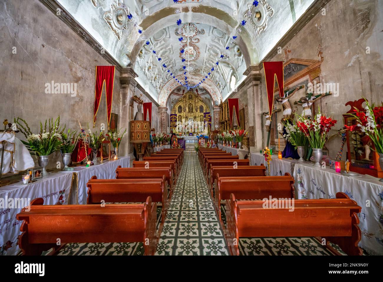 The nave and decorated ceiling of the Spanish colonial Church of San ...