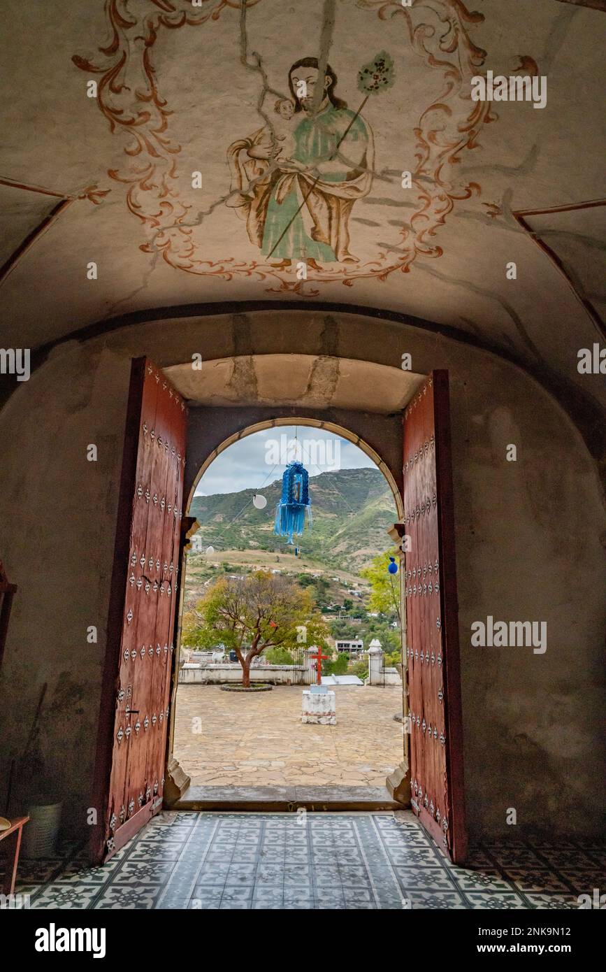 A fresco over the entrance to the Spanish colonial Church of San Miguel ...