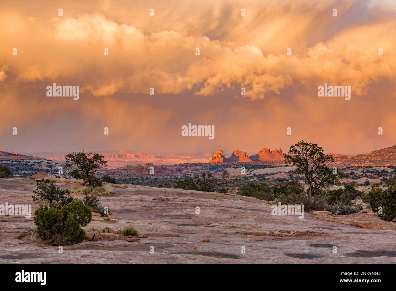 Summer monsoon clouds over Arth's Pasture and Arches National Park ...