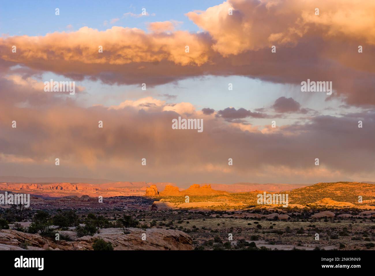 Summer monsoon clouds over Arth's Pasture and Arches National Park ...