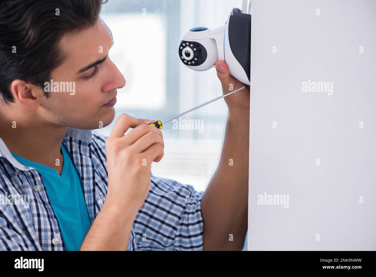 Security camera setup, cctv installation Stock Photo - Alamy