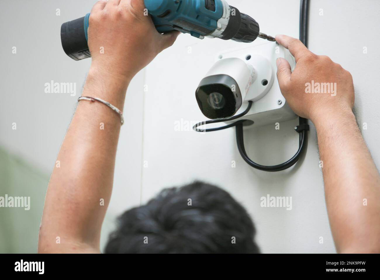 Security camera setup, cctv installation Stock Photo - Alamy