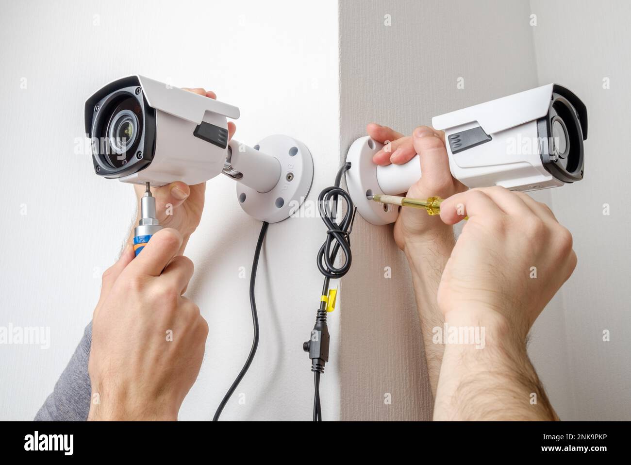 Security camera setup, cctv installation Stock Photo - Alamy
