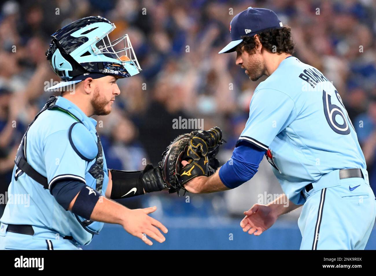 Toronto Blue Jays' closing pitcher Jordan Romano, right, celebrates ...