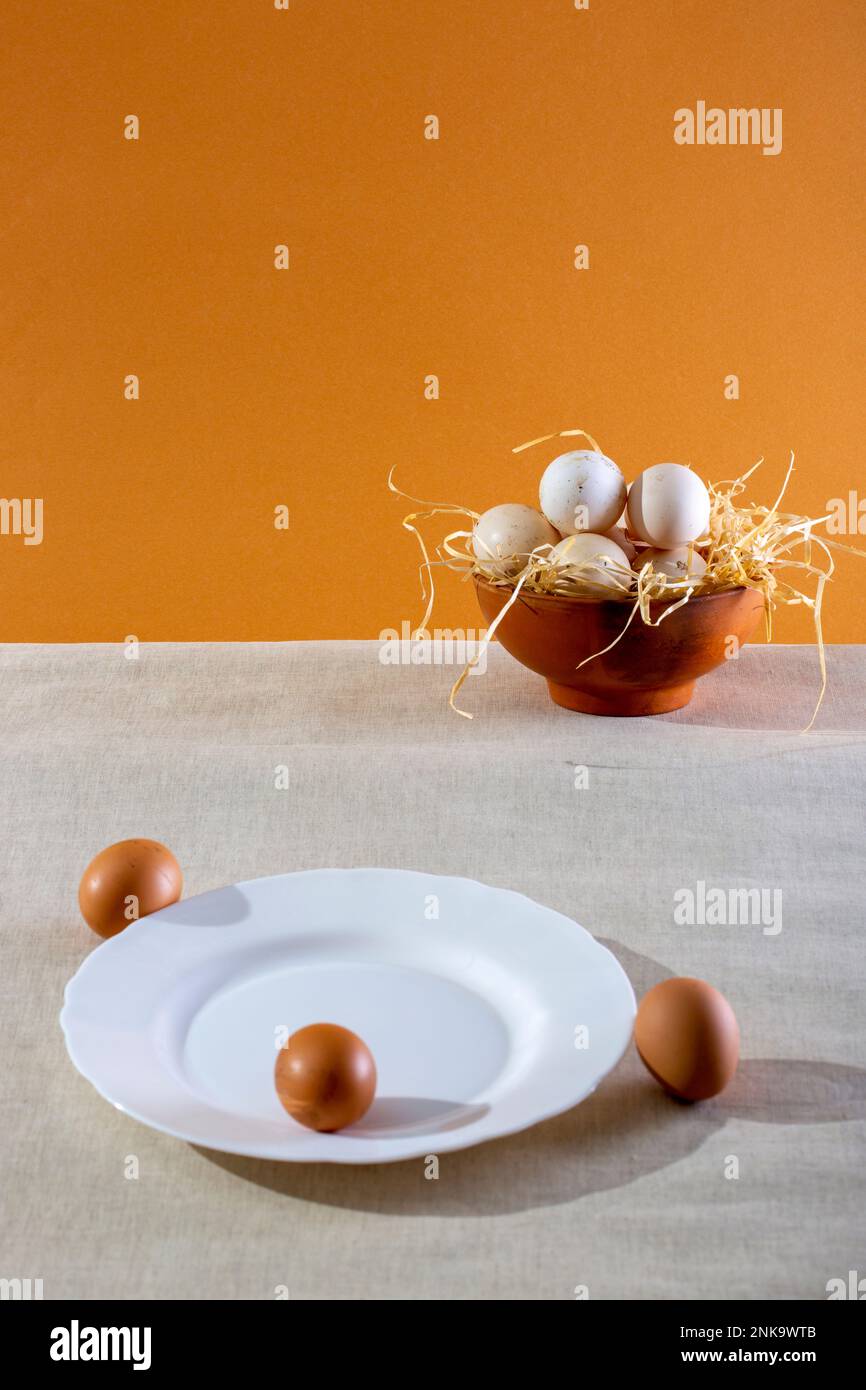 Still life with chicken eggs in plates Stock Photo - Alamy