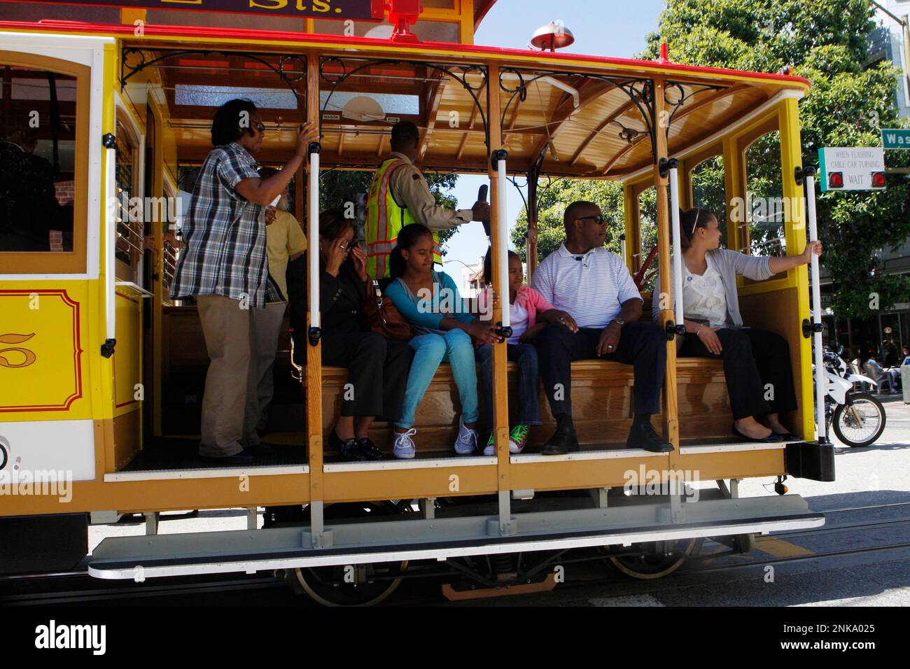 Malia and Sasha Obama ride on the #15 Cable on Washington Street near ...