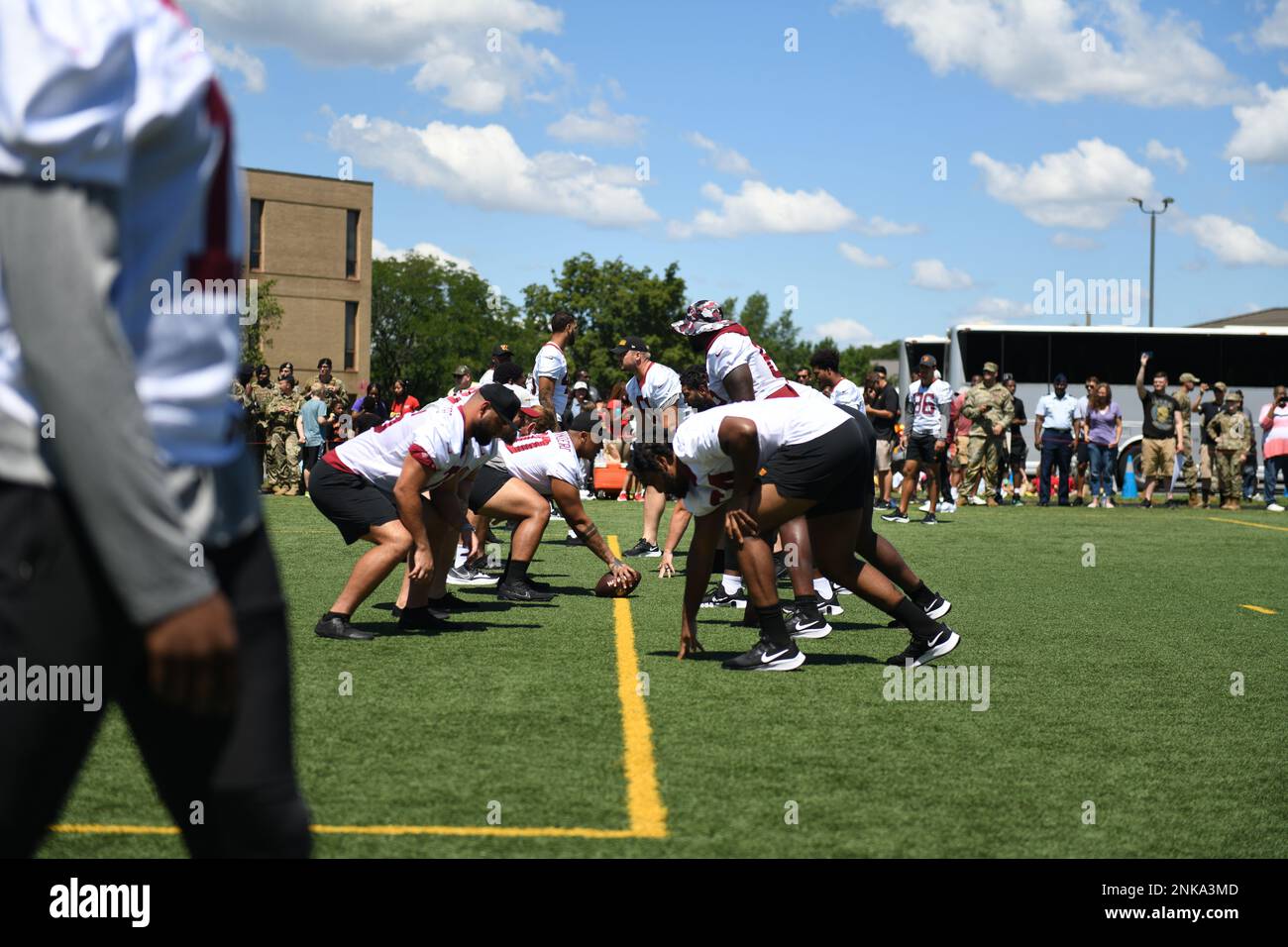 The Washington Commanders football team demonstrates various plays used ...