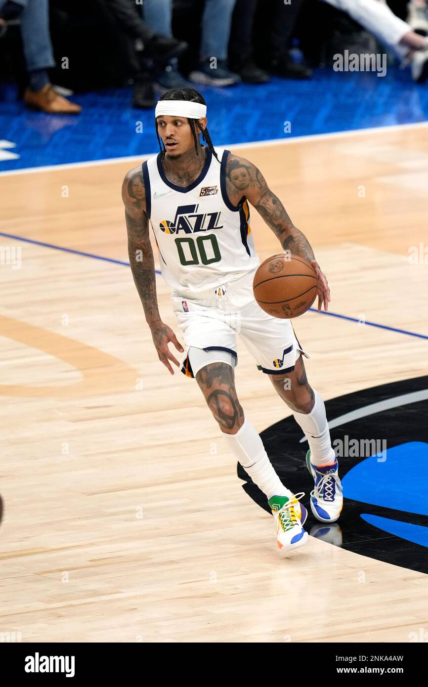 Utah Jazz guard Jordan Clarkson (00) brings the ball up court during ...