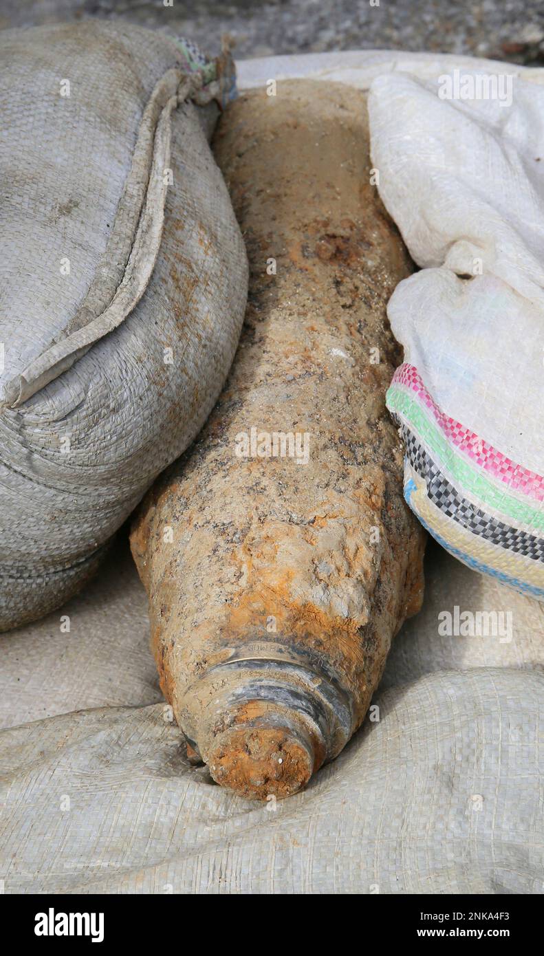 An unexploded 5-inch US Naval artillery bomb is pictured in Naha City ...
