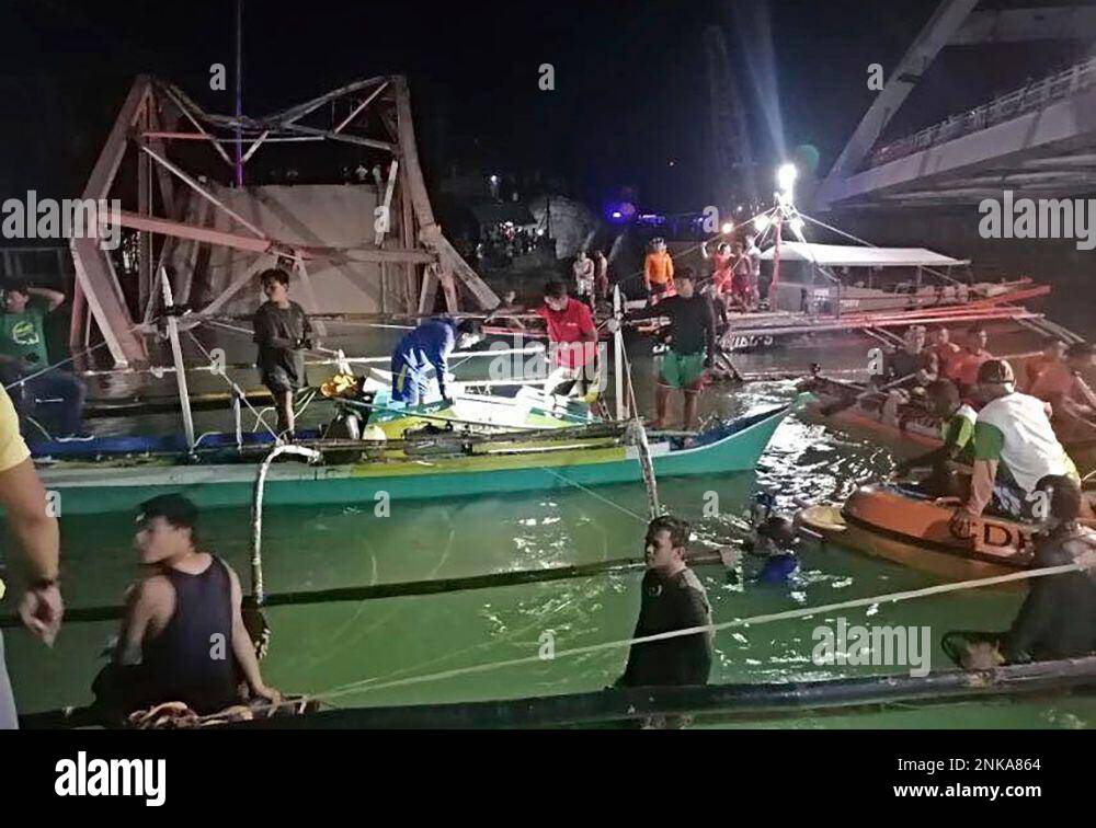 In this photo provided by the Philippine Coast Guard, rescuers conduct ...