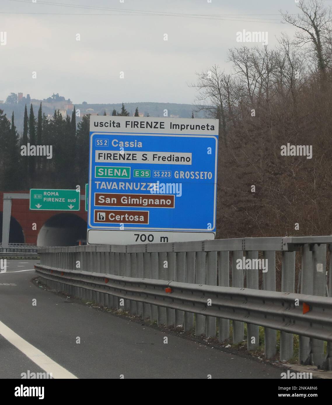 Wide italian Road Signal at crossroad with name of City Siena San ...