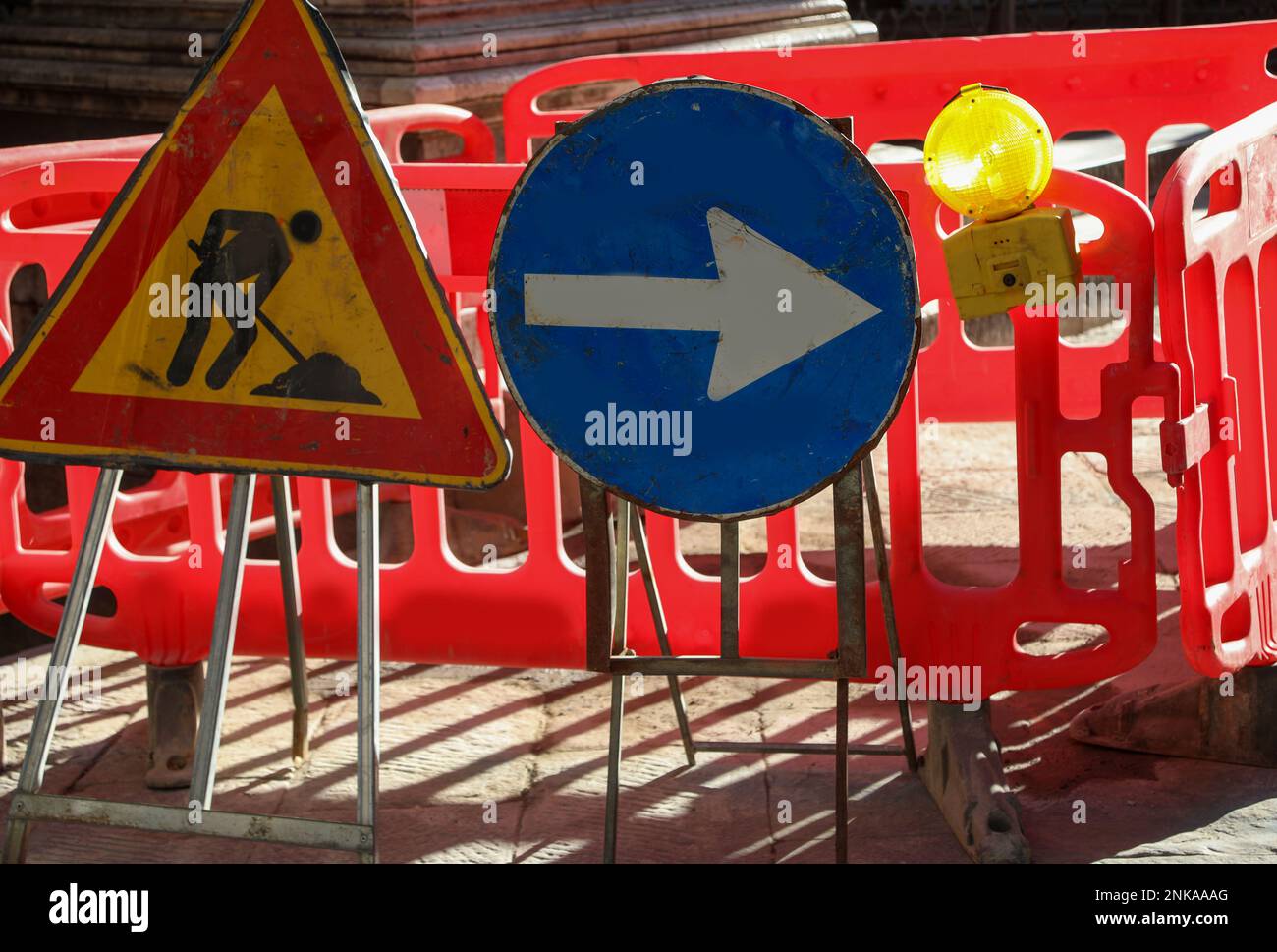 road construction site in the city and the signs with the big arrow ...