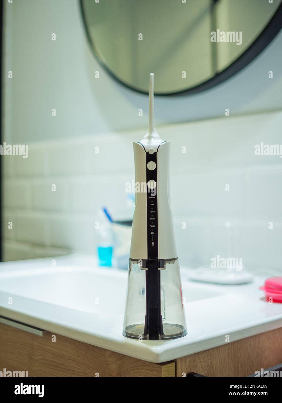 domestic dental water flosser on the bathroom wash basin Stock Photo ...