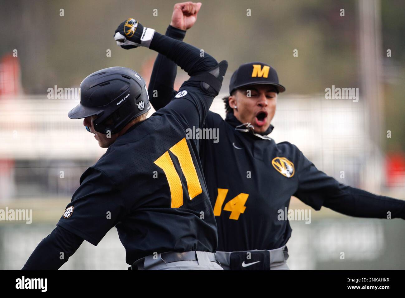 Missouri Tigers third baseman Luke Mann (11) celebrates hitting a home ...