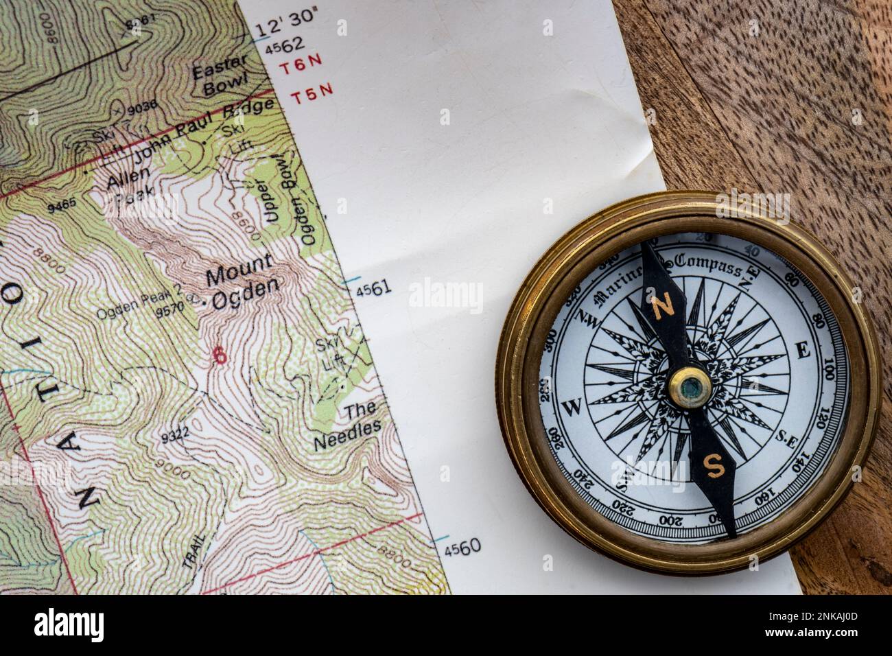 Topographical map with compass hi-res stock photography and images - Alamy