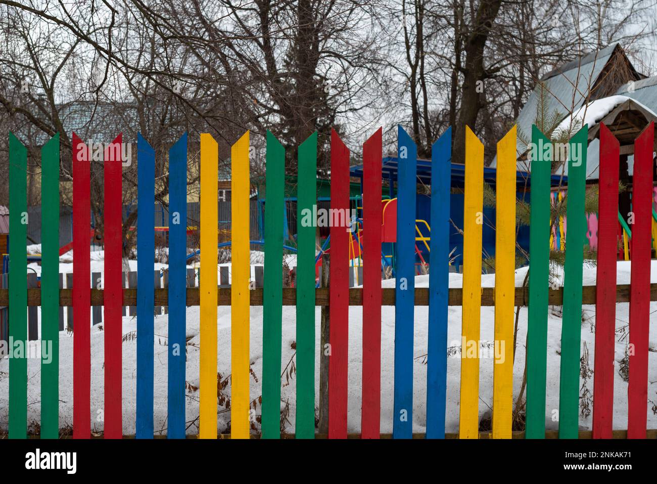 Multi colored wooden fence Stock Photo - Alamy