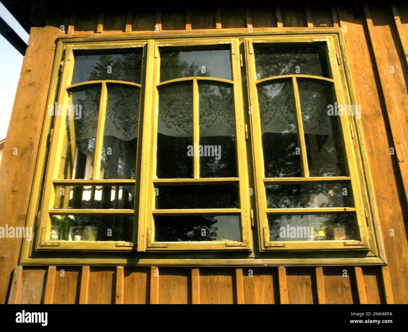 Windows of a traditional wooden house in Solonetu Nou, Suceava County ...