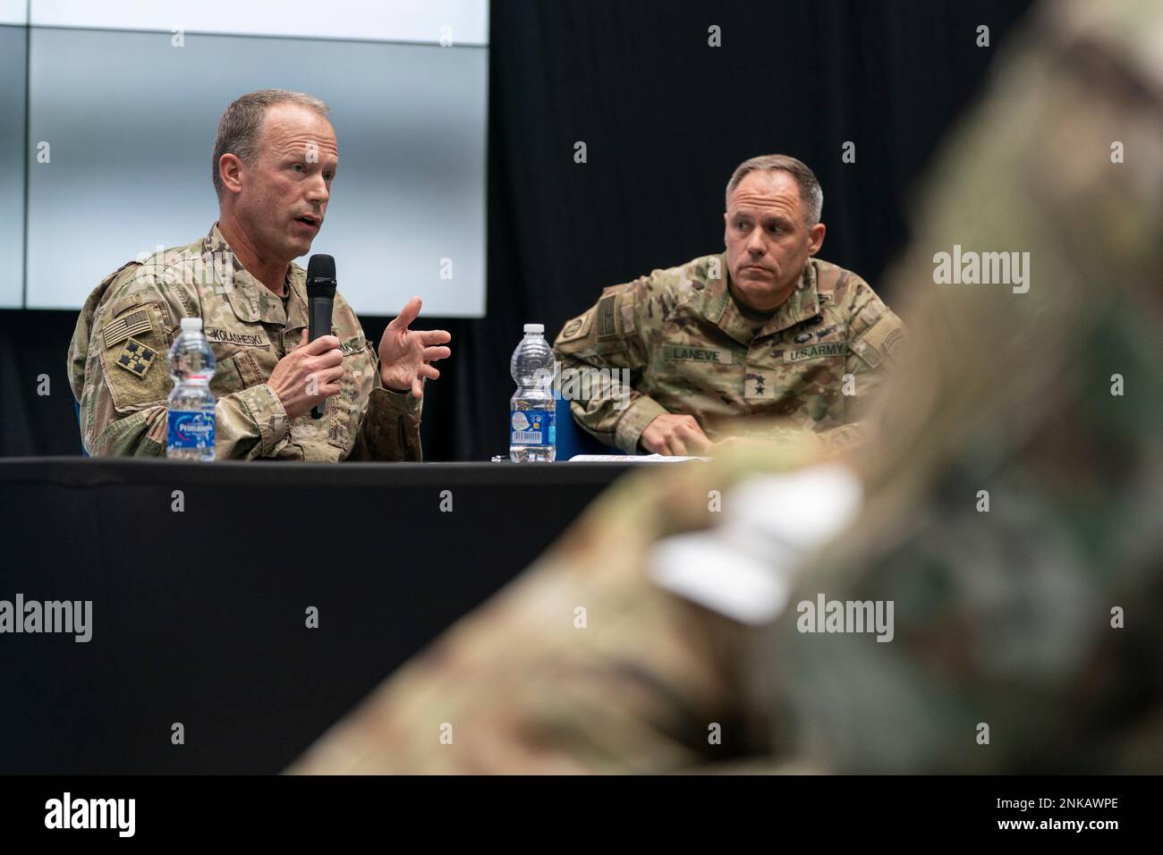 U.S. Army Lt. Gen. John Kolasheski, left, the Commanding General of V ...