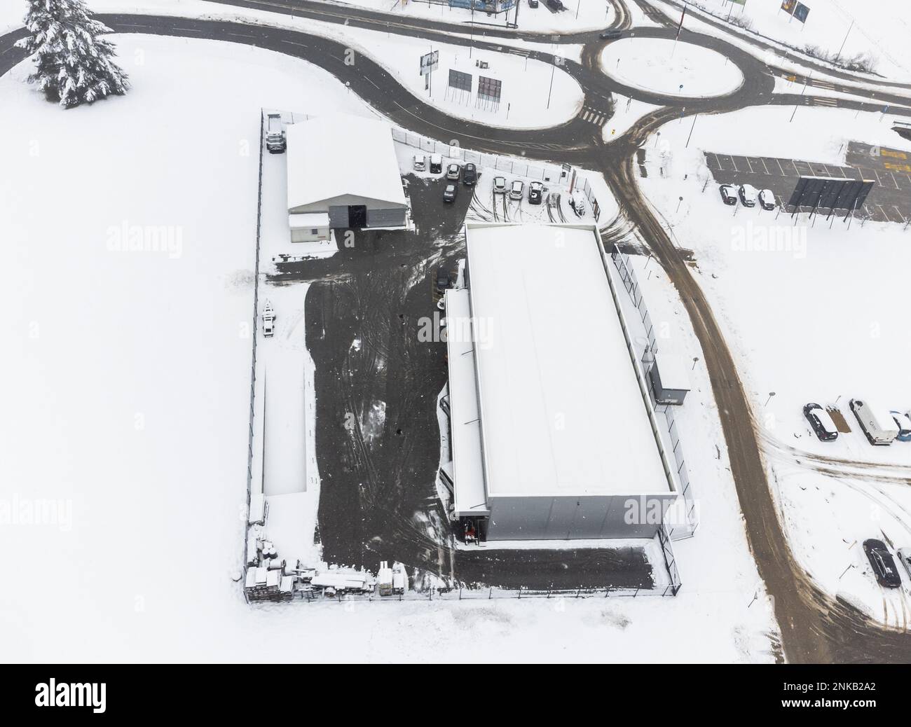 Road maintenance depot warehouse. Winter season. Covered with snow ...