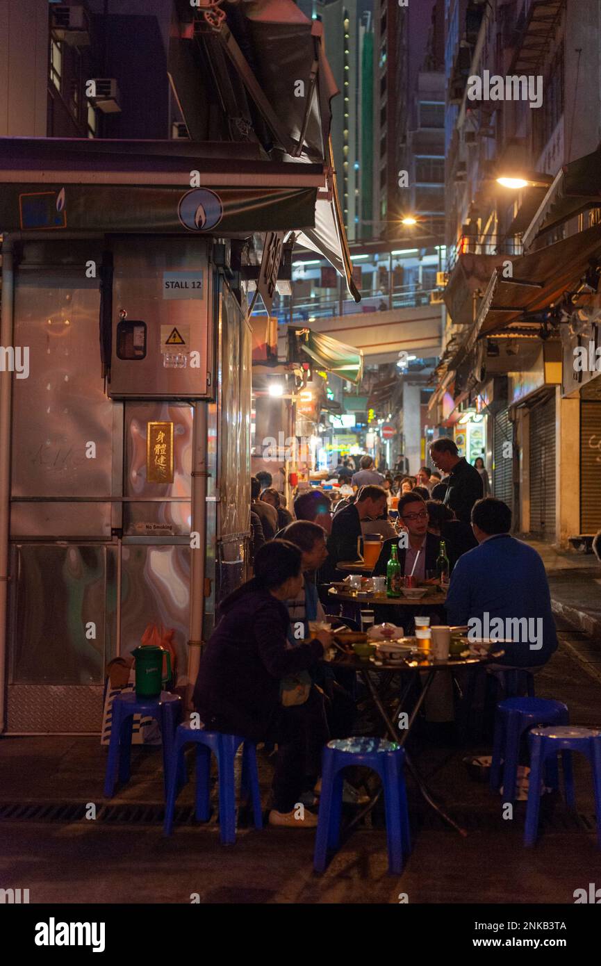 Diners at dai pai dong outdoor eateries on Stanley Street, Hong Kong ...