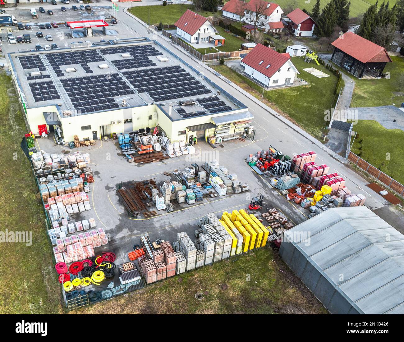 Outdoor warehouse with solar panels in the back of hardware store ...