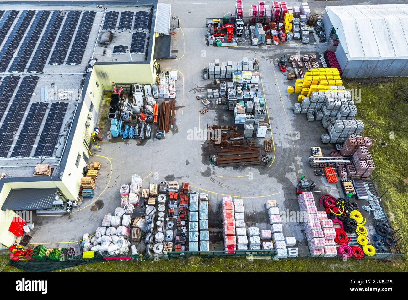 Outdoor warehouse with solar panels in the back of hardware store ...