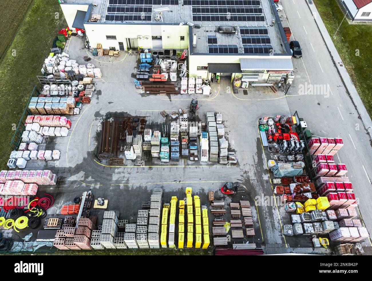 Outdoor warehouse with solar panels in the back of hardware store ...