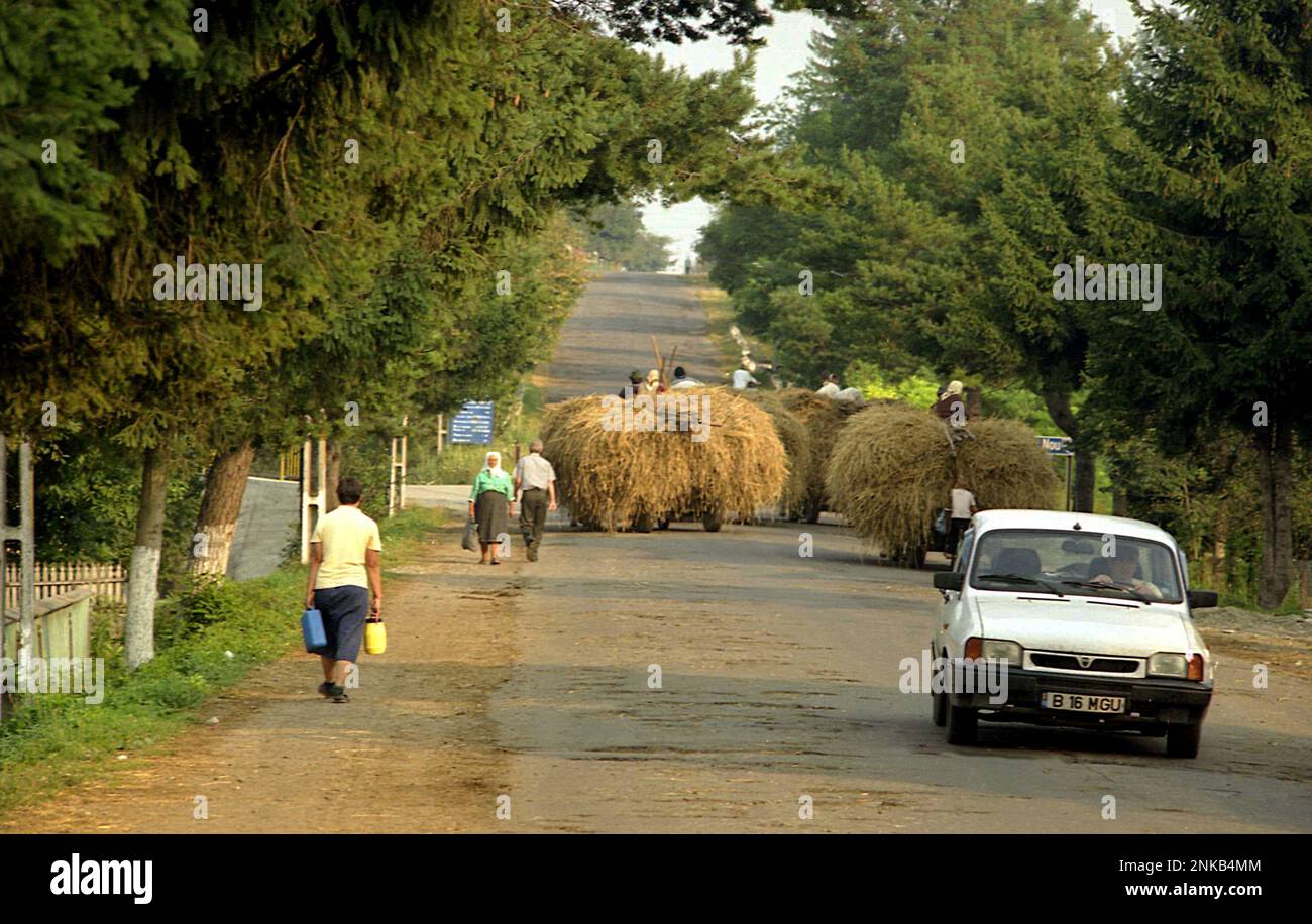 Solonetu Nou, Suceava County, Romania, 2001. Horse-drawn wagons ...