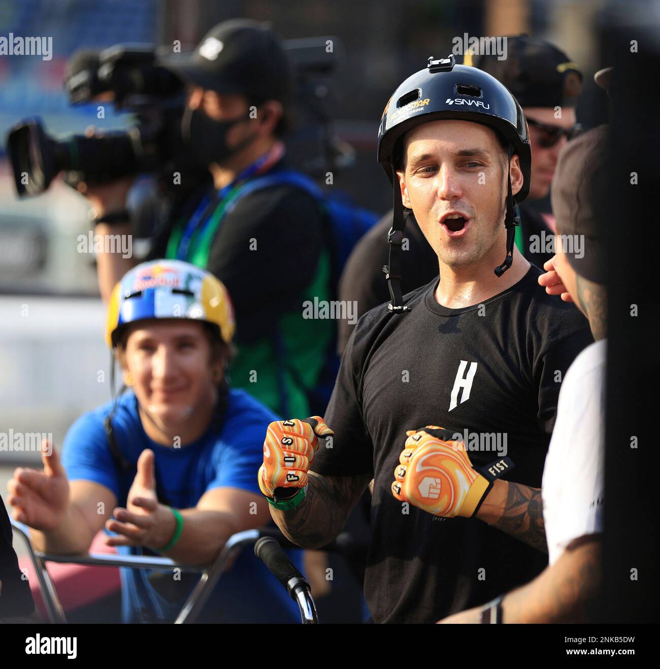 Logan Martin (R) of Australia celebrates after winning the BMX Park at ...