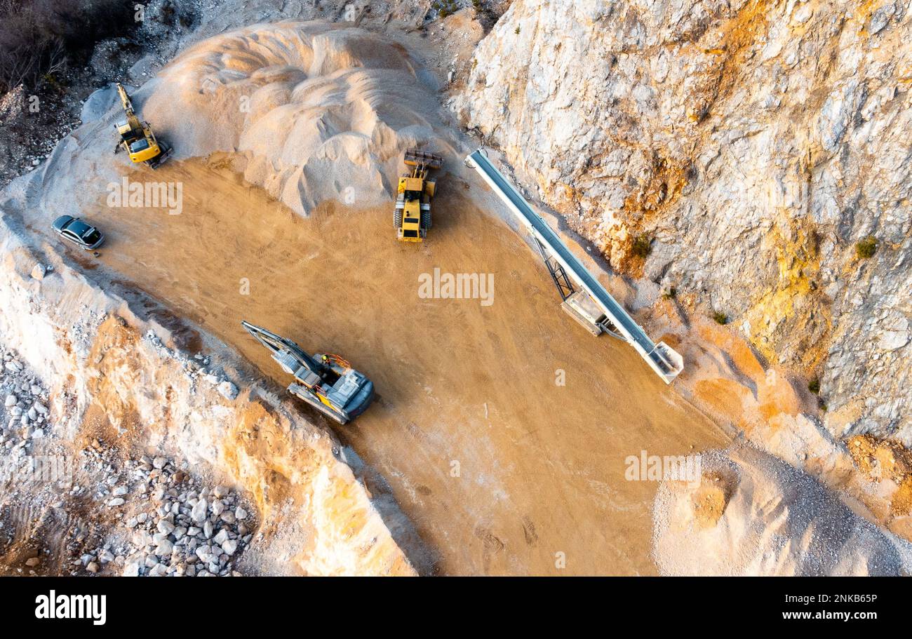Aerial view quarry working equipment hi-res stock photography and ...