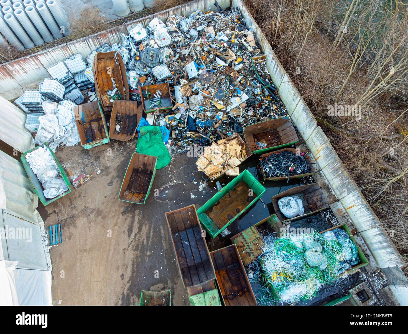 Recycling center with different garbage types and empty containers top ...