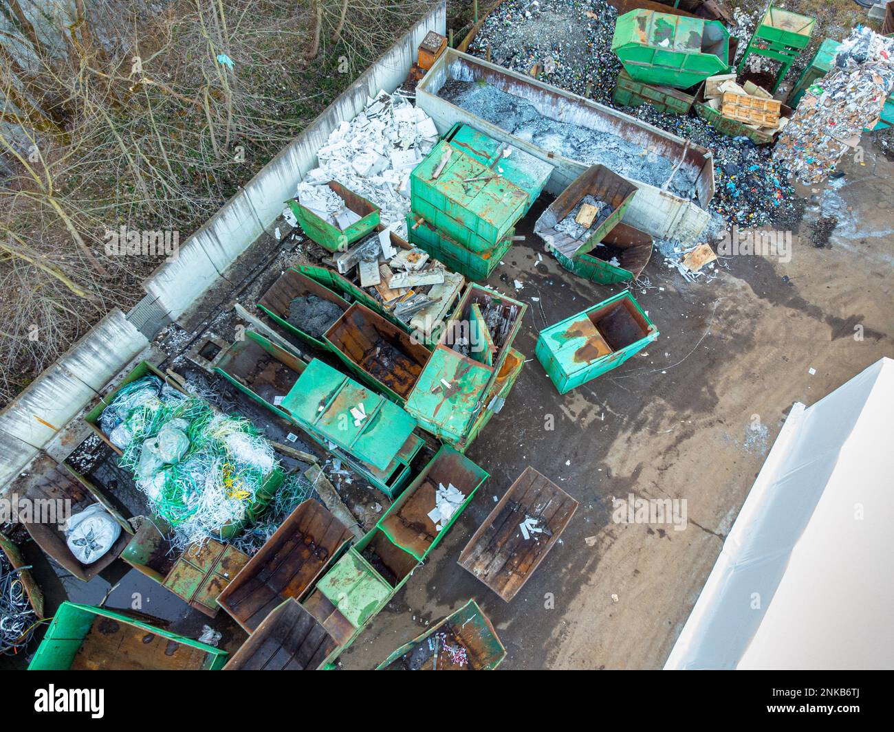 Recycling center with different garbage types and empty containers top ...