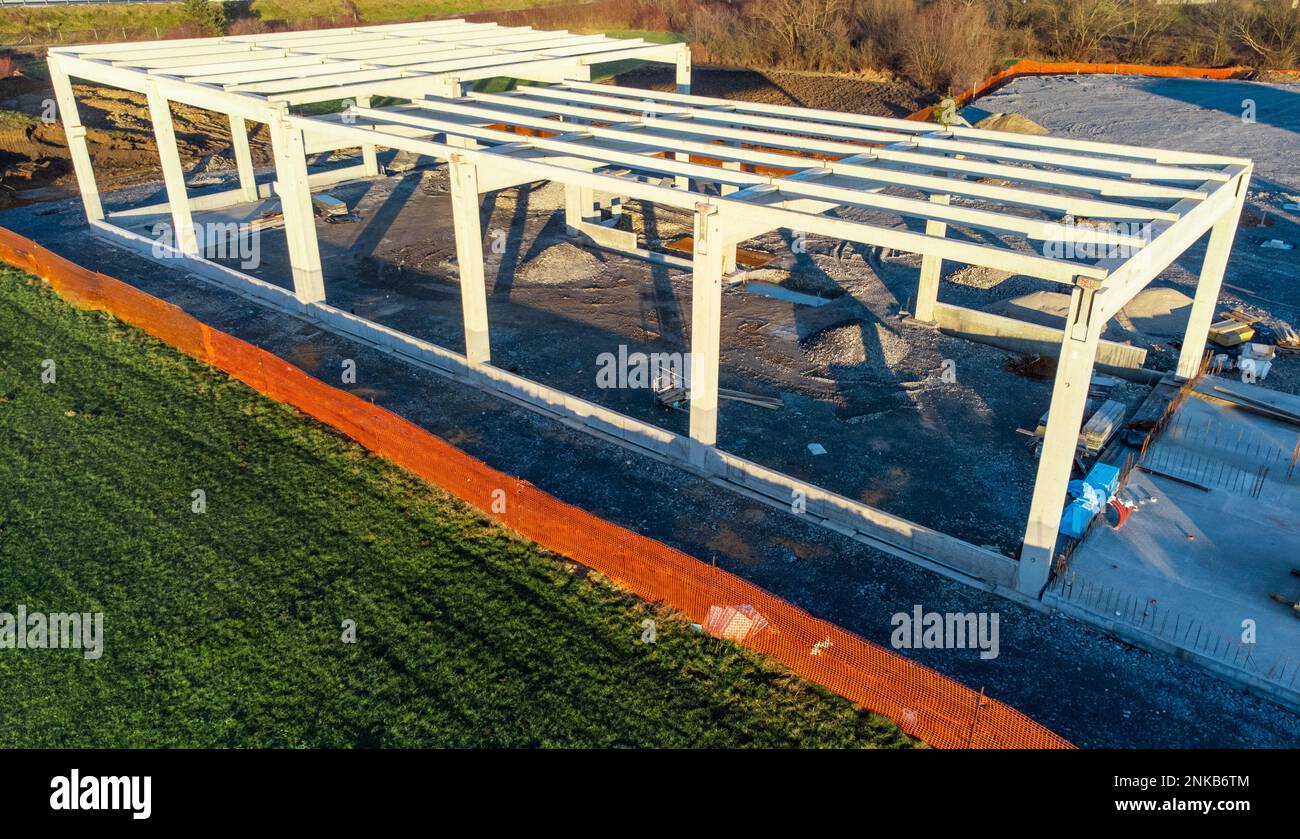 Prefabricated concrete skeleton frame building, building site, aerial ...