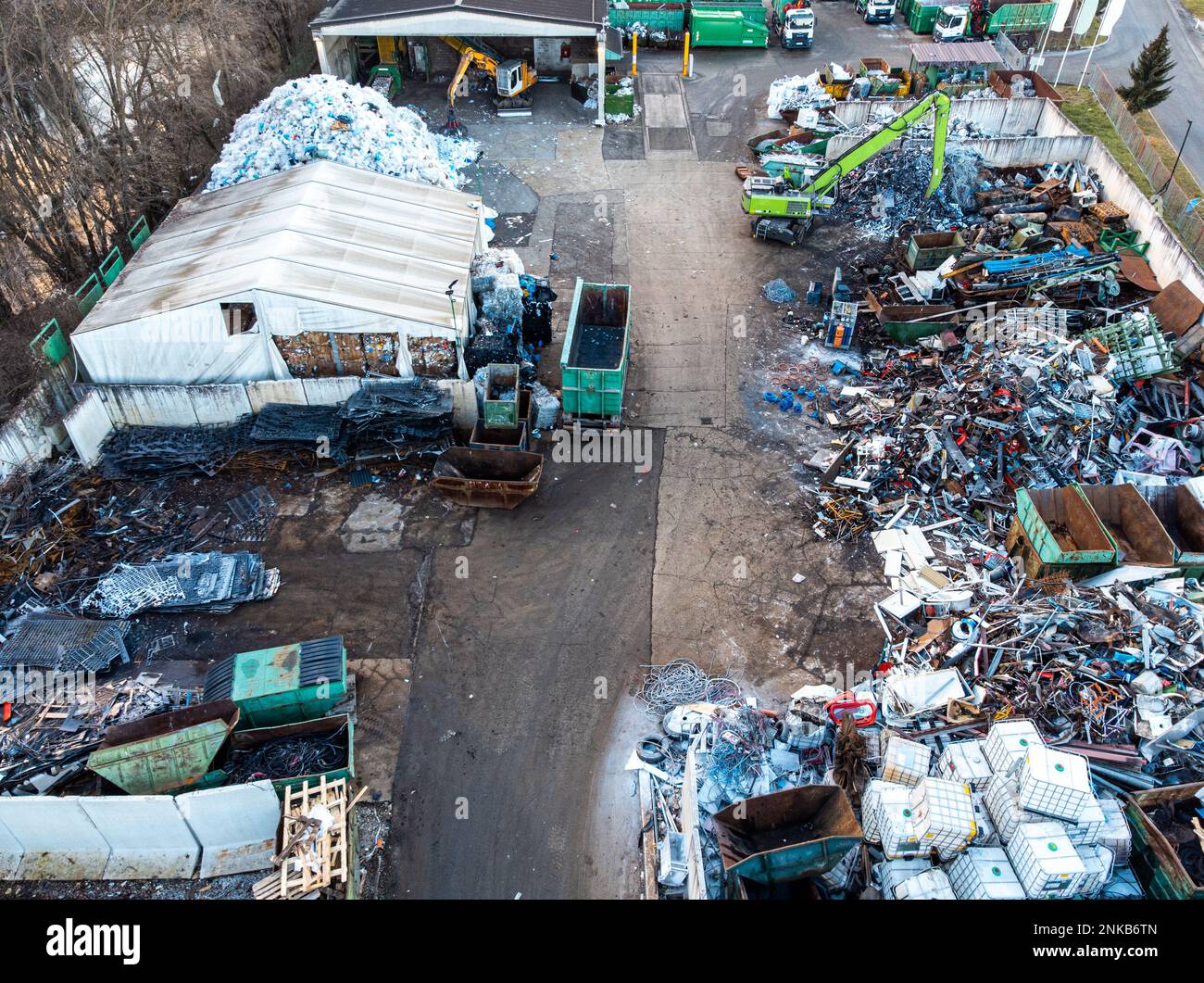 Recycling center with different garbage types and empty containers top ...