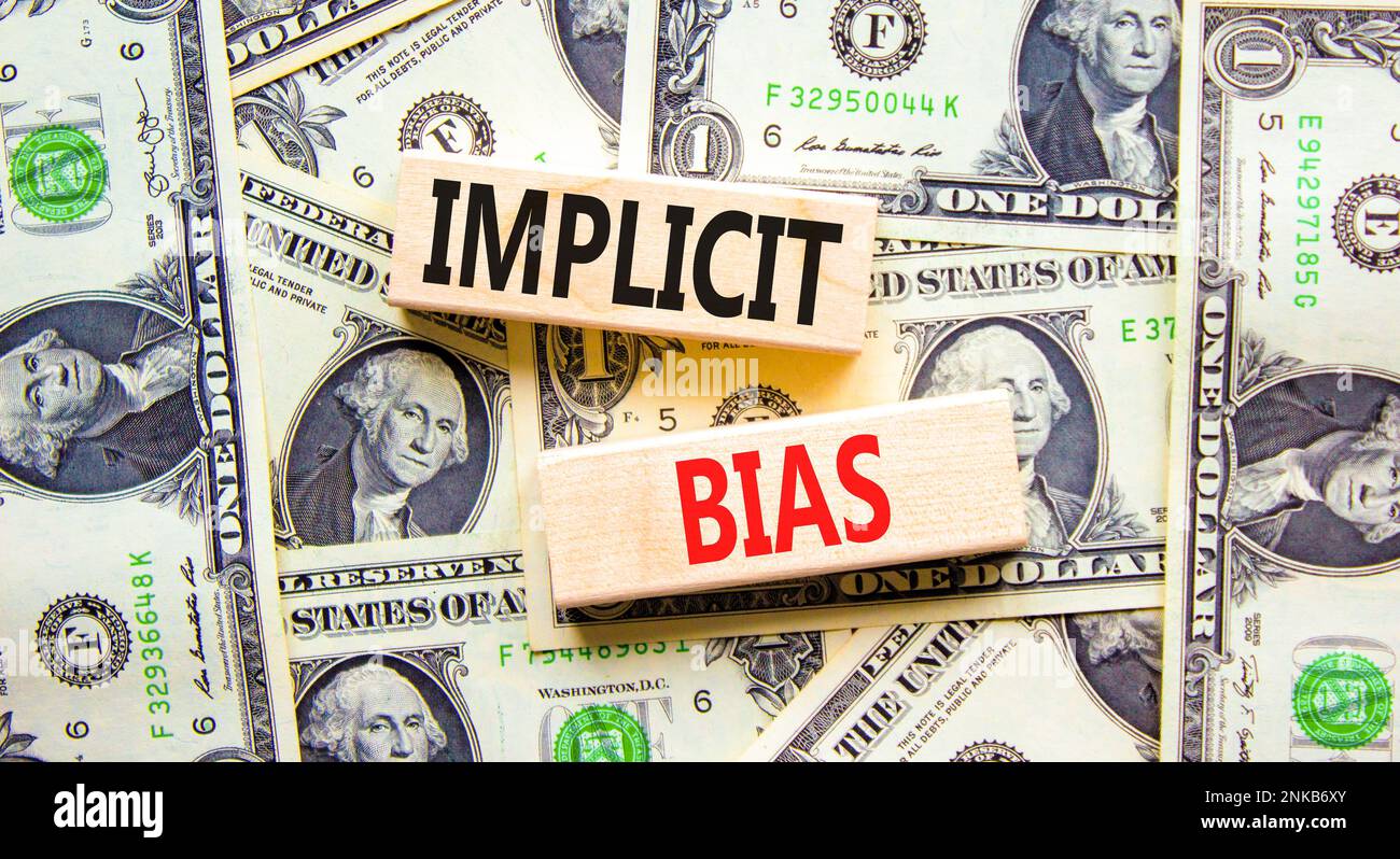 Implicit bias symbol. Concept words Implicit bias on wooden block ...