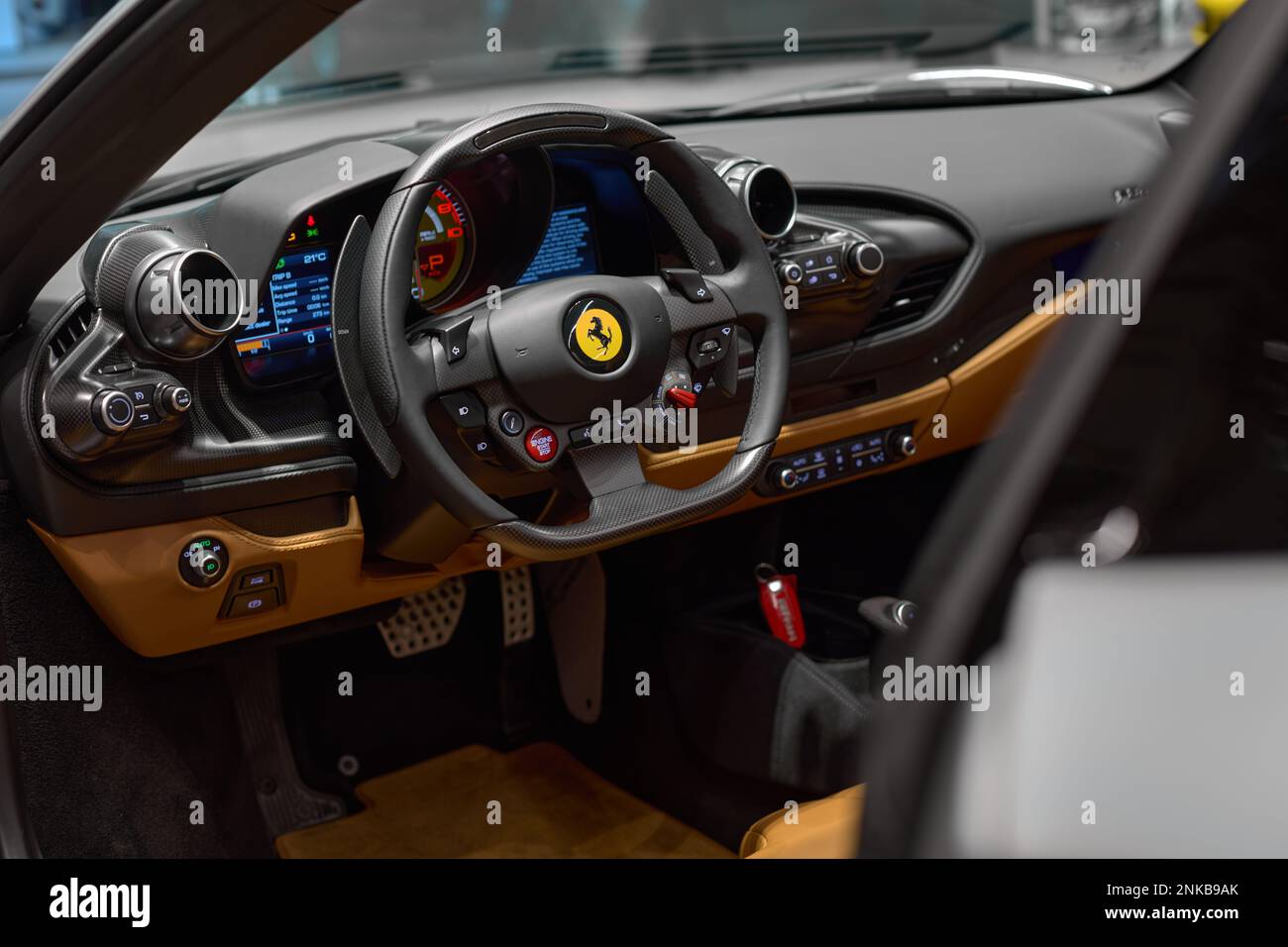 Steering wheel and interior Ferrari F8 Tributo Spider. view through the ...