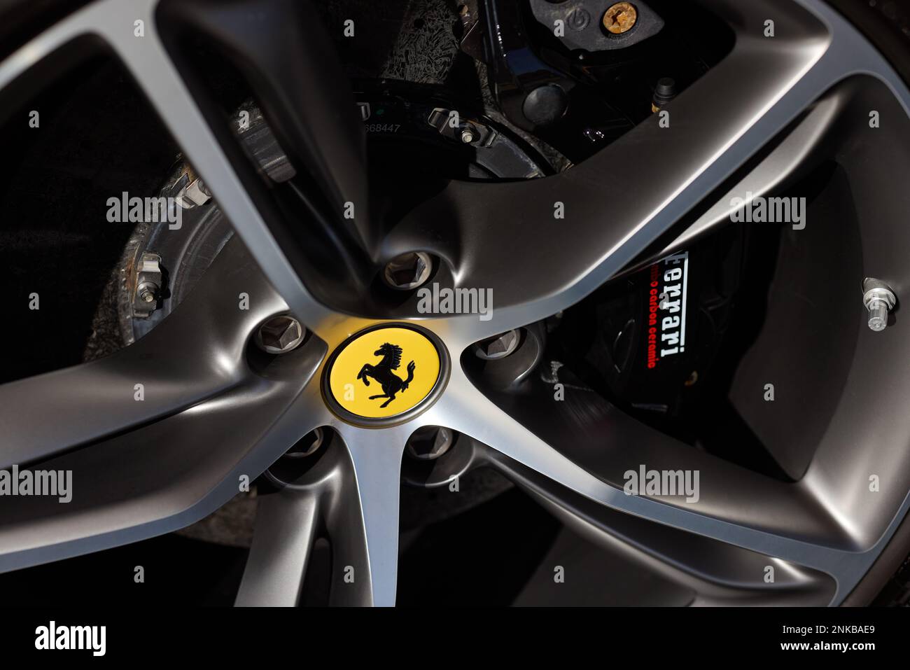 The wheel of a red Ferrari 296 GTB. Katowice, Poland, 17.10.2022 Stock ...