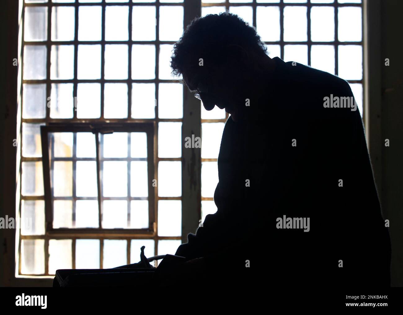 Jesuit priest Fr. Bernie Bush spends time in the old cell house chapel ...