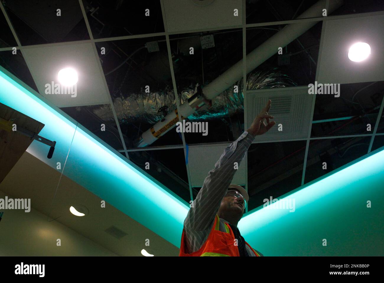 Senior Hospital Project Manager Christian Ovlen stands in a partially ...