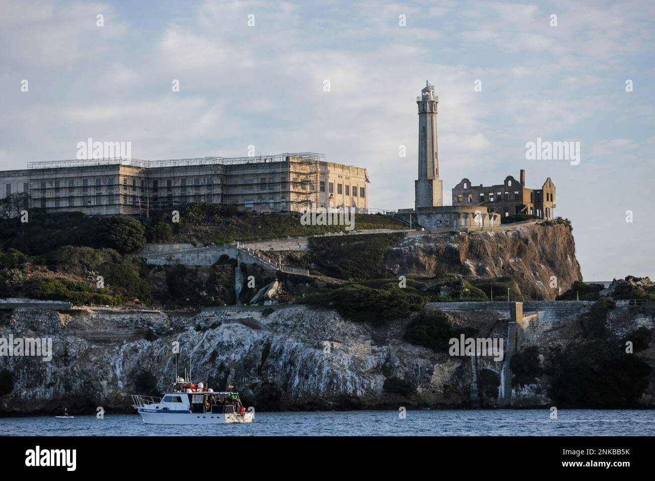 A boat full of swimmers pulls up next to Alcatraz Island, ahead of the ...