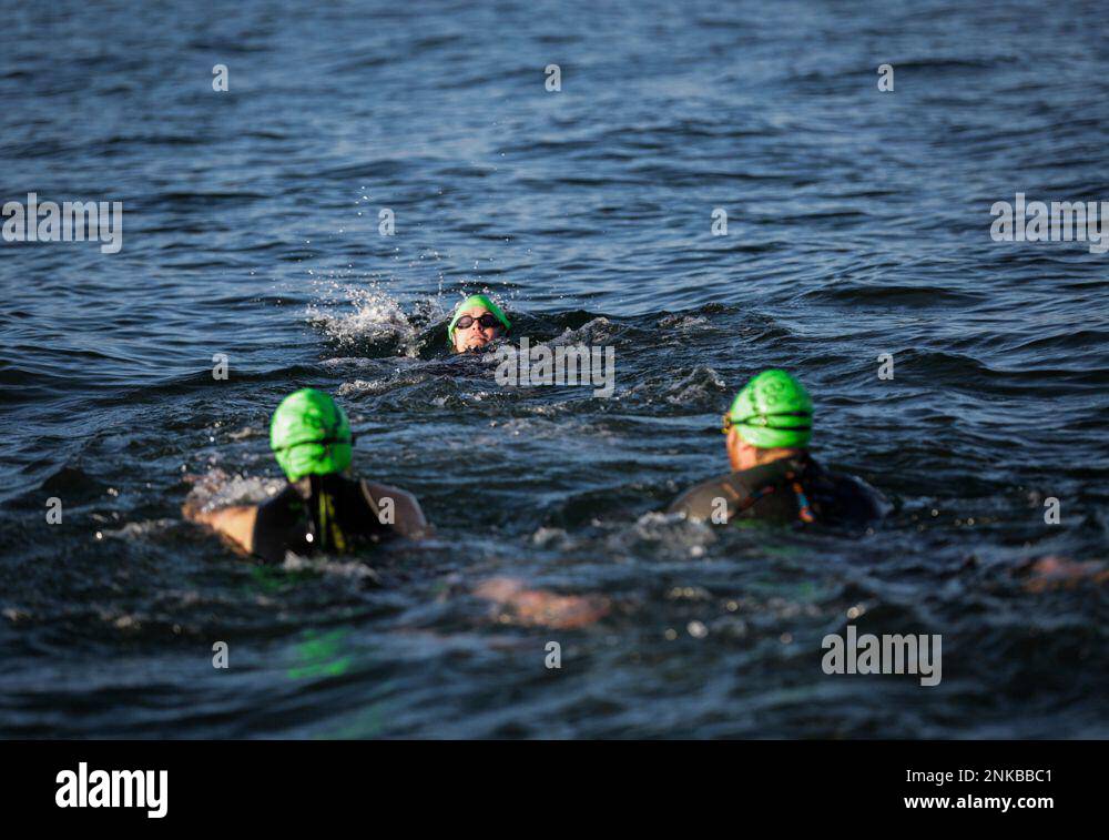 Swimmers are seen in the San Francisco Bay as they begin the fifth ...
