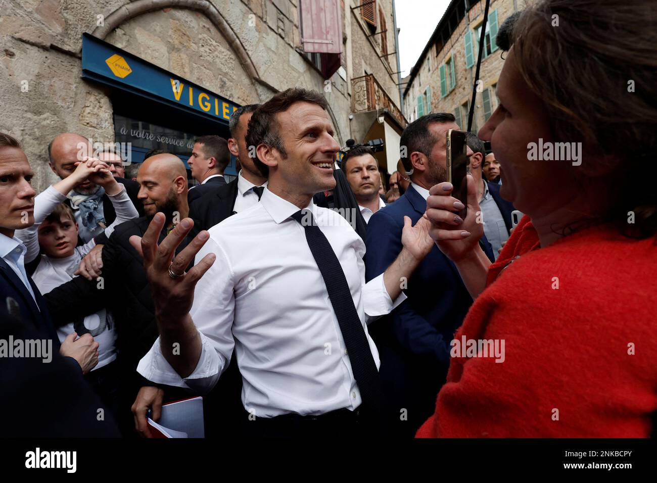 Centrist candidate and French President Emmanuel Macron reacts as he ...