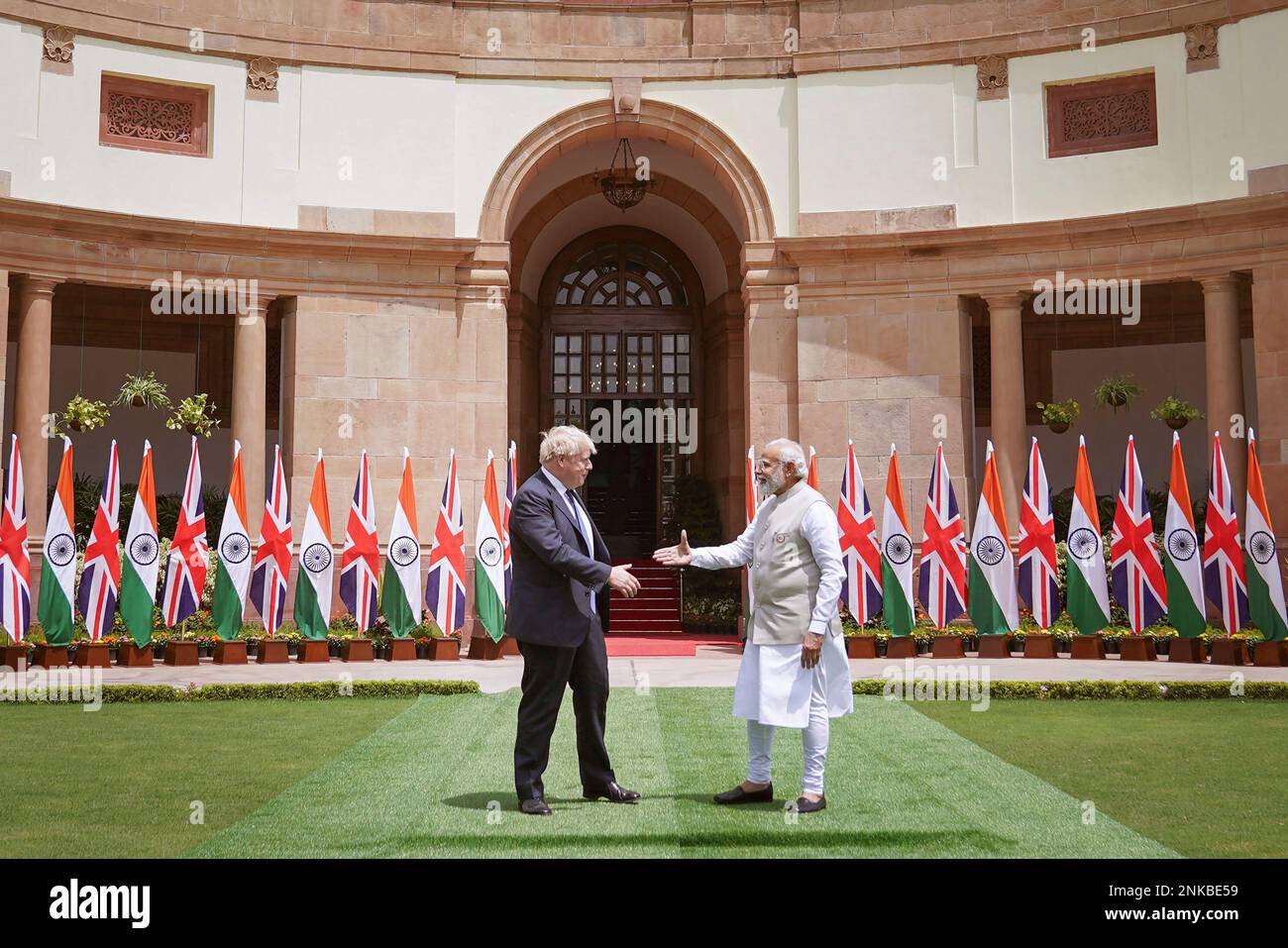 British Prime Minister Boris Johnson, left, meets Indian Prime Minister ...