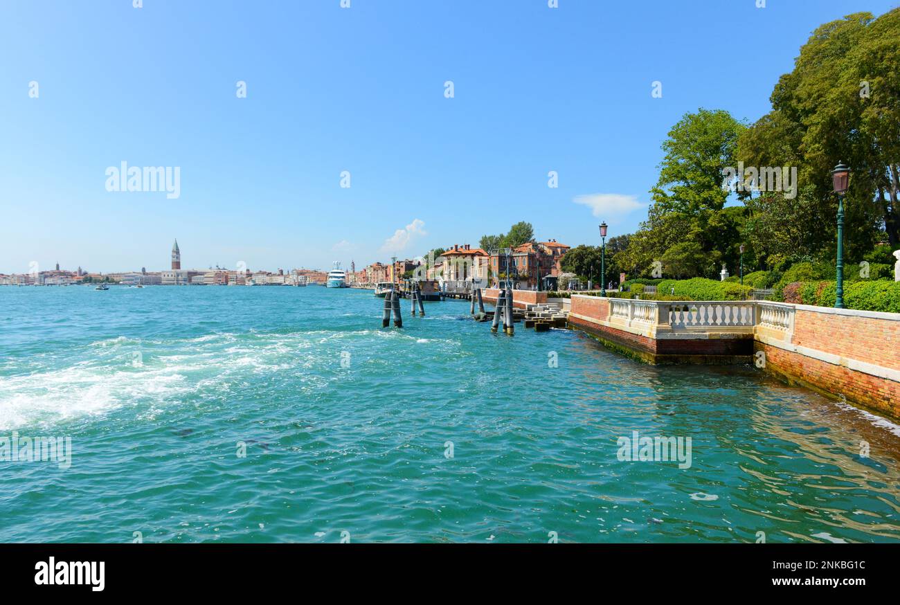View of the Grand Canal on a hot summer morning. Blue sky, azure water ...