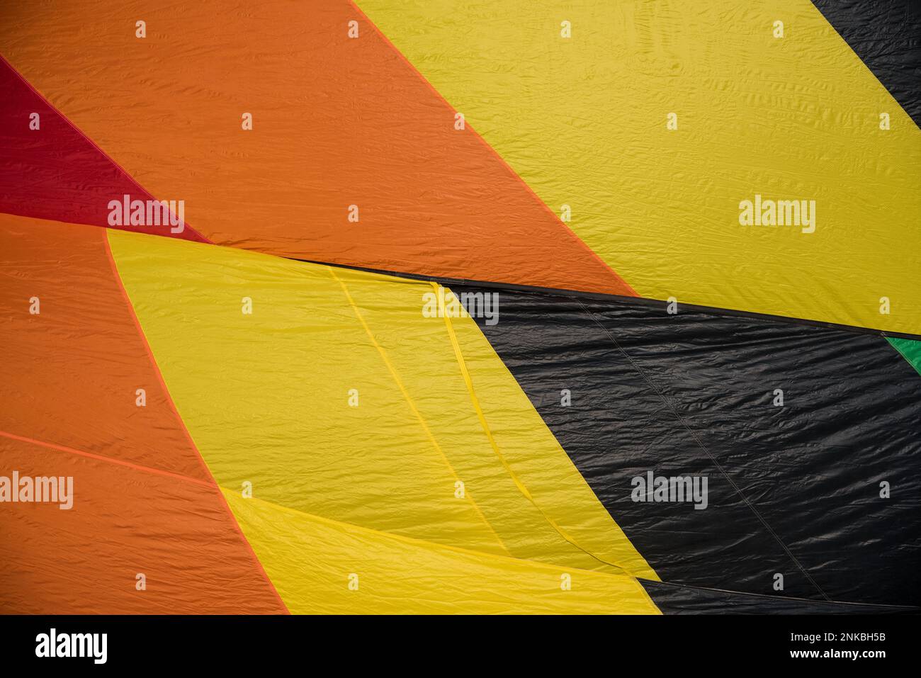 Bold and garish colors and patterns of hot air balloons Stock Photo - Alamy