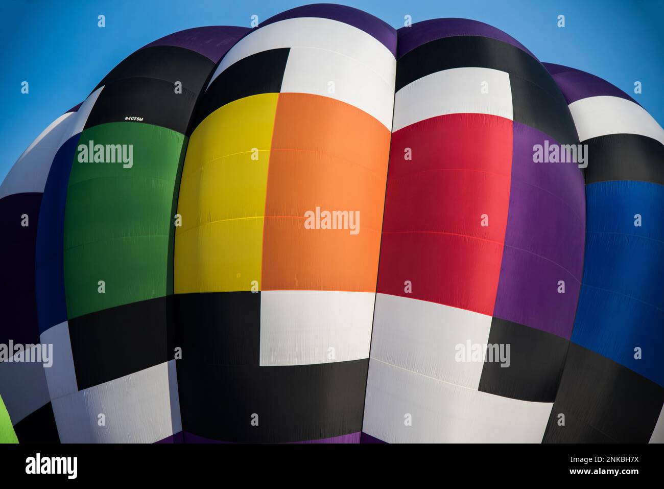 Bold and garish colors and patterns of hot air balloons Stock Photo - Alamy