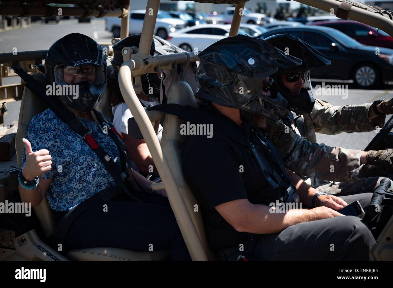 Honorary commanders go for a ride in a MRZR Aug. 12, 2022, at Joint ...
