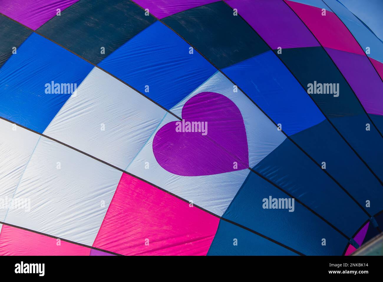 Bold and garish colors and patterns of hot air balloons Stock Photo - Alamy