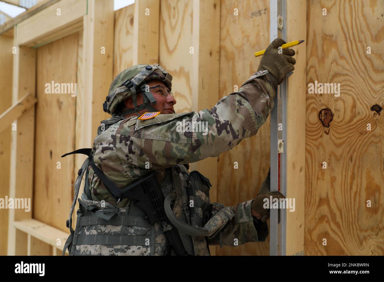 U.S. Army Reserve Spc. Henry Regalado, a carpenter with the 716th ...